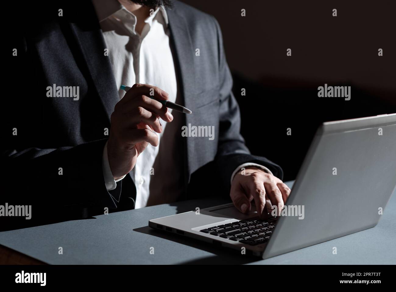 Businessman Typing Important Concept Into Lap Top And Pointing New Idea ...