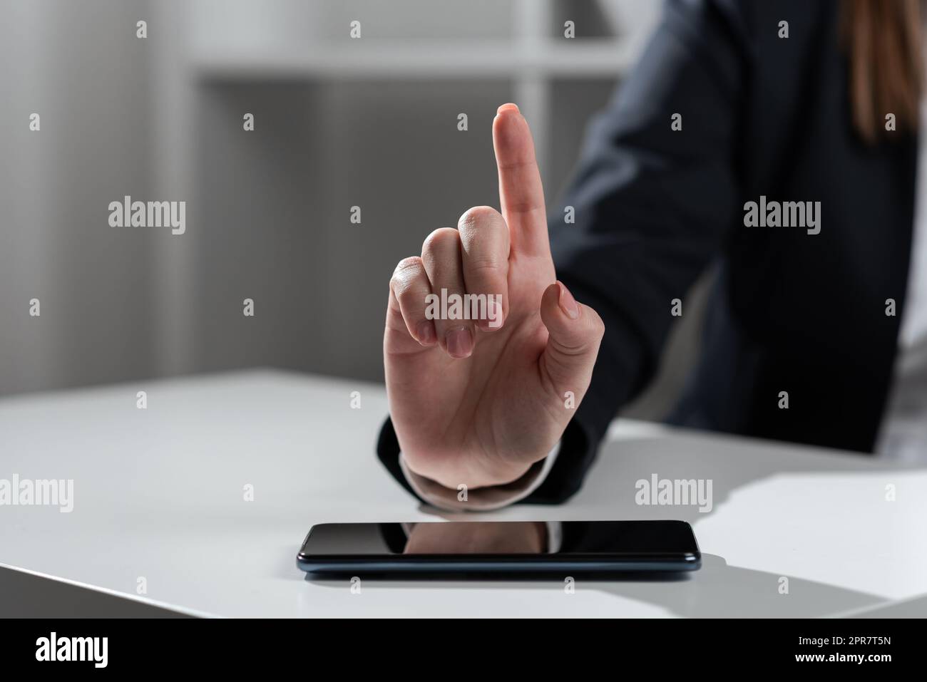 Businesswoman Pointing With One Finger On Important Messages On Desk ...