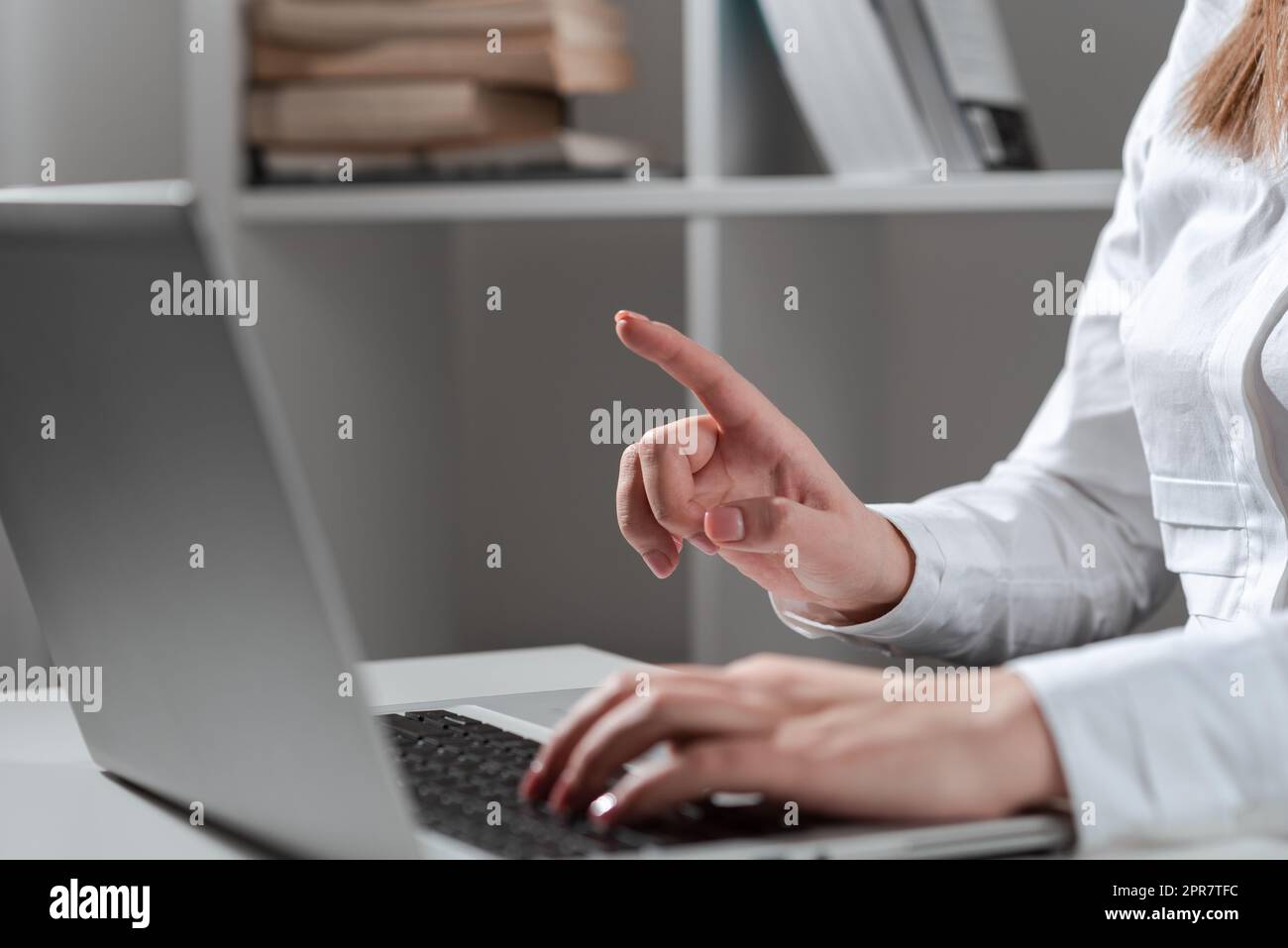 Businesswoman Typing Recent Updates On Lap Top Keyboard On Desk And ...