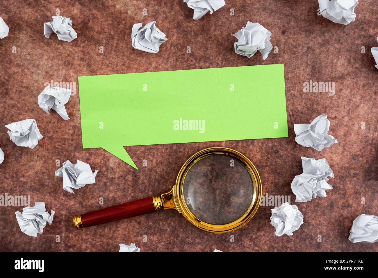 Speech Bubble Made Of Sheet With Magnifying Glass Surrounded With ...