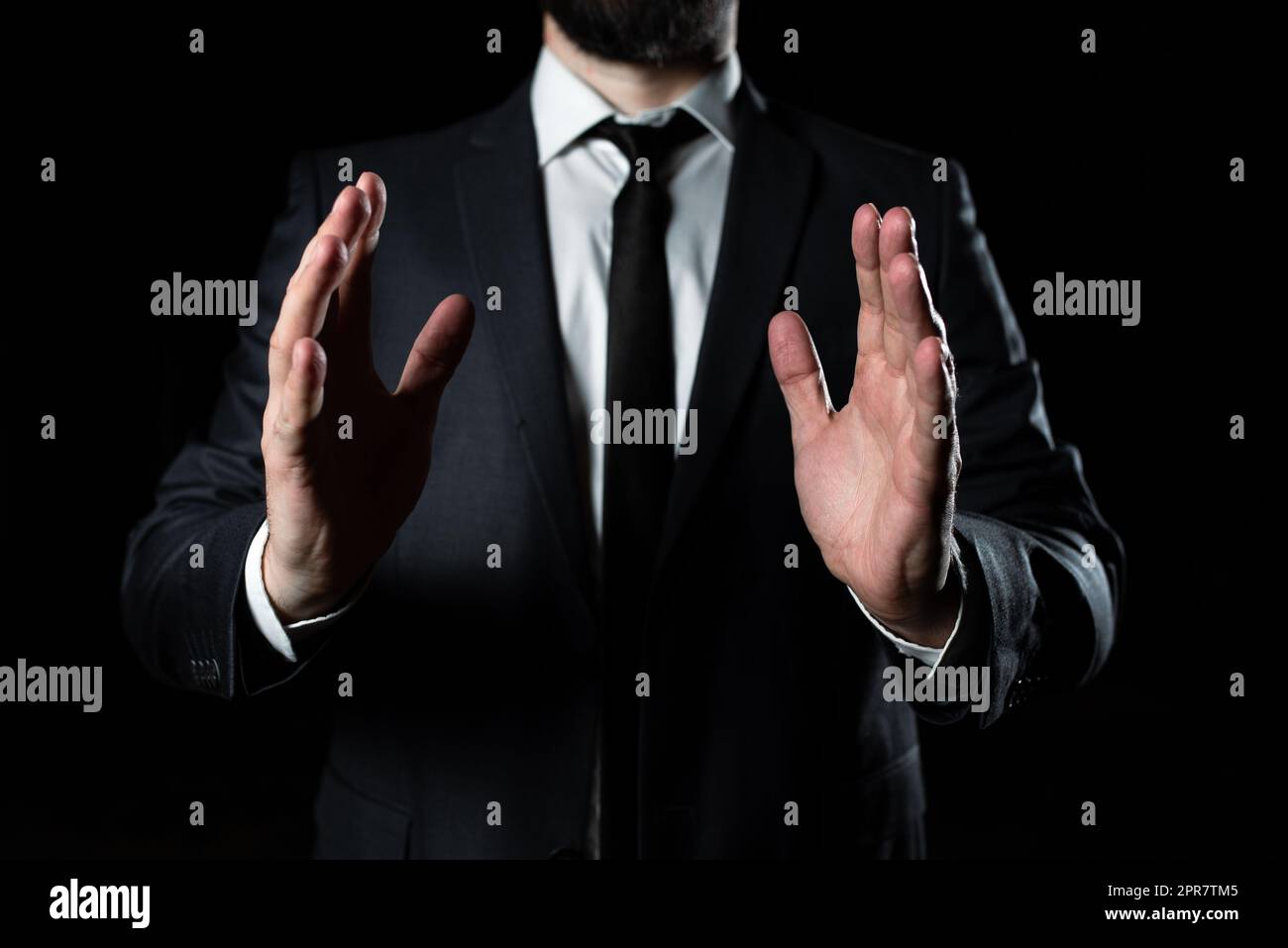 Businessman Holding Important Message Between Hands. Man In Suit ...