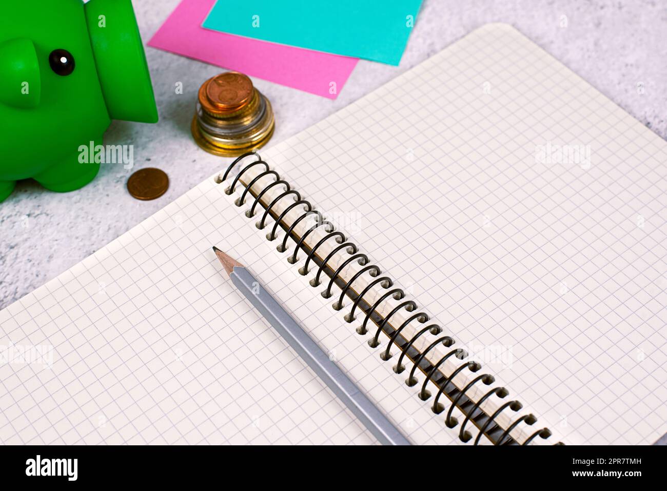 Important Message On Notebook On Desk With Money, Pen, Notes And Pig ...