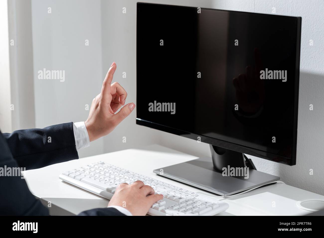 Businesswoman Typing Recent Updates On Lap Top Keyboard On Desk And ...