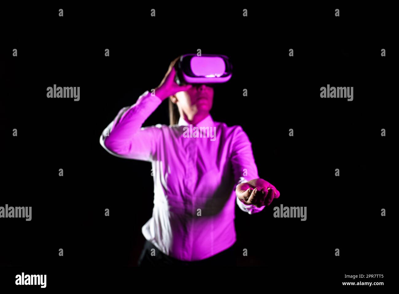 Female Manager Wearing Virtual Reality Goggles Gesturing While Taking ...