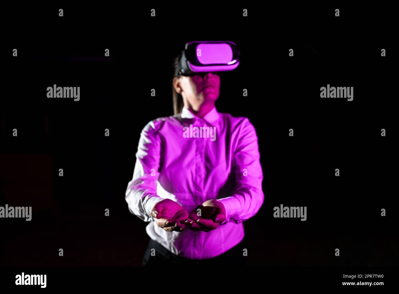 Female Manager Wearing Virtual Reality Goggles Gesturing While Taking ...