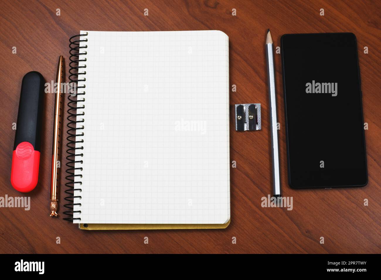 Notebook With Important Message On Desk With Pen, Pencil, Sharpener ...