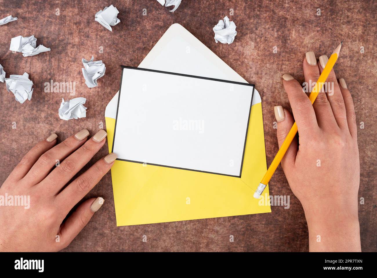 Hands Of Woman With Blank Sheet, Envelope, And Crumpled Papers Over ...