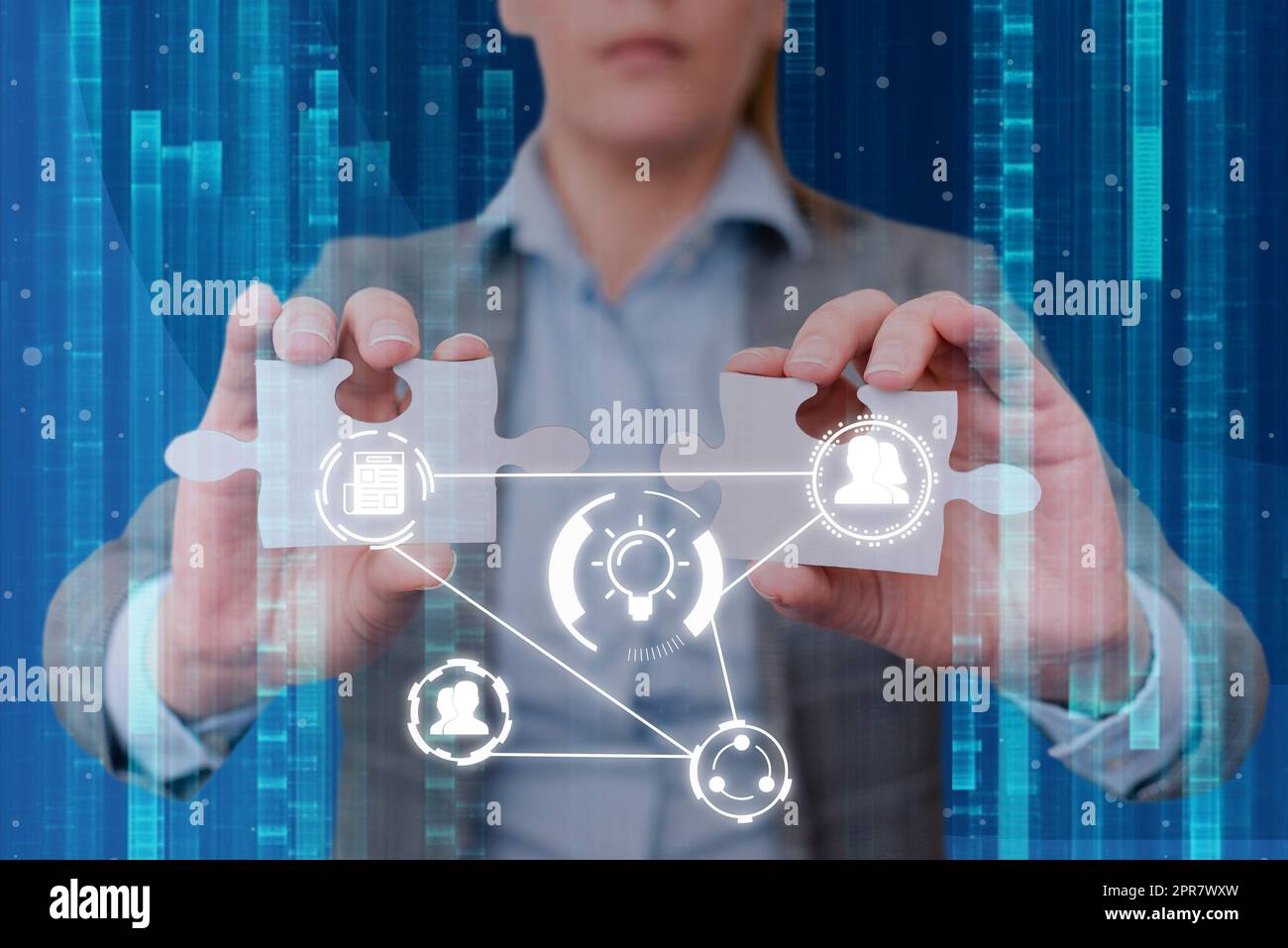 Lady in suit holding two puzzle pieces representing innovative thinking ...