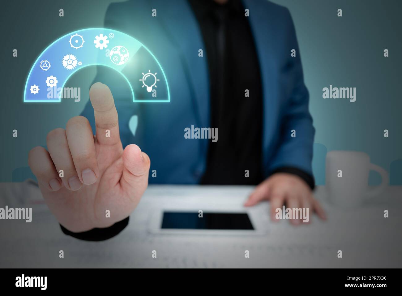 Businessman in suit pointing upwards representing innovative thinking ...