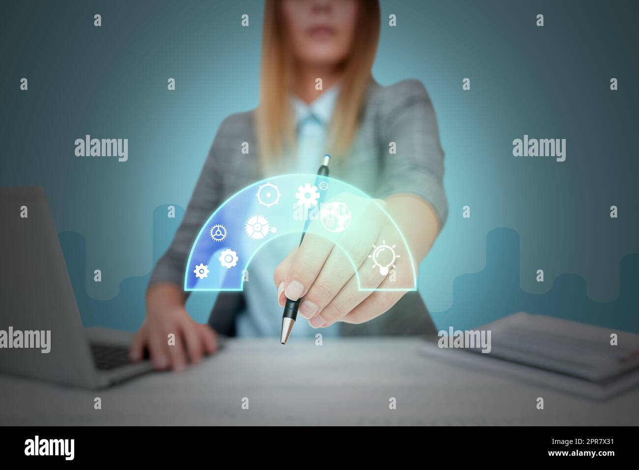 Lady in suit holding pen representing innovative thinking symbolizing ...