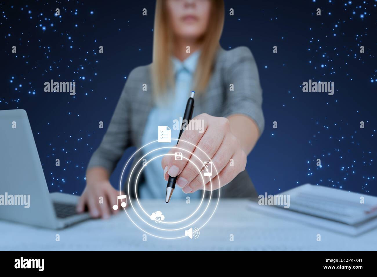 Lady in suit holding pen representing innovative thinking symbolizing ...