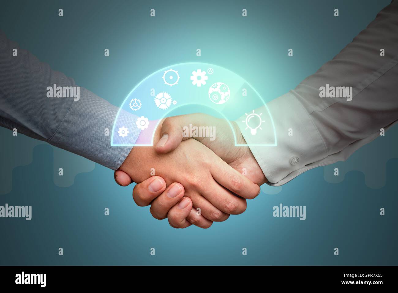 Hands shaking presenting innovative plan ideas symbolizing successful ...