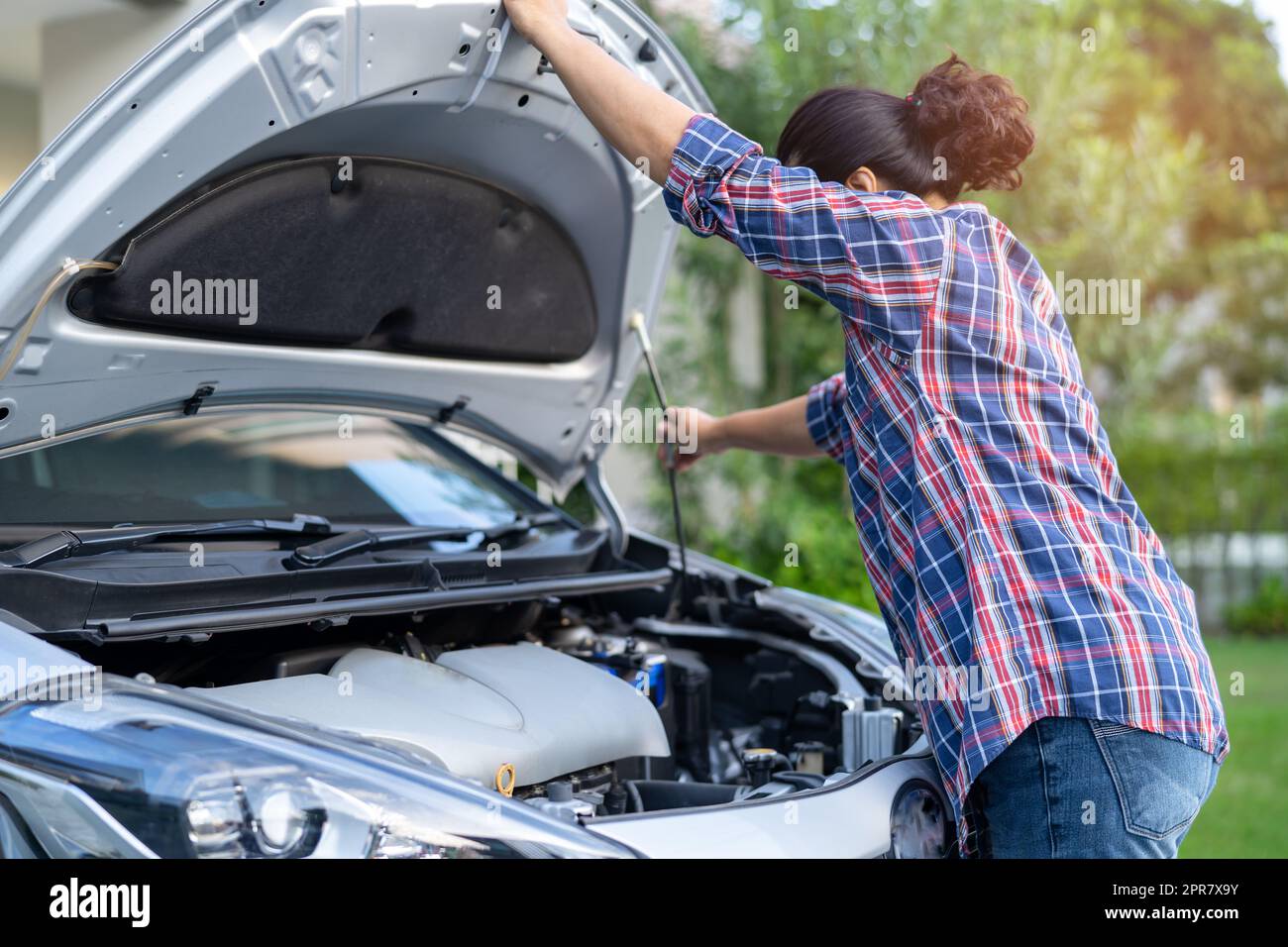 Open hood mechanic engine system to check and repair damage car crash ...