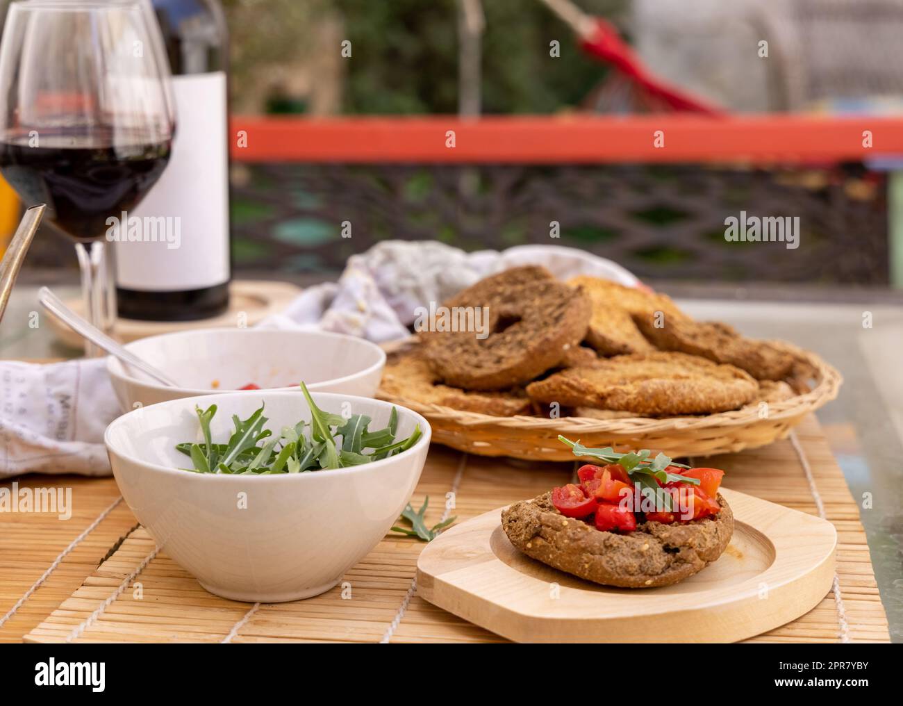 Tipical summer south Italian appetizer Friselle with cherry tomatoes ...