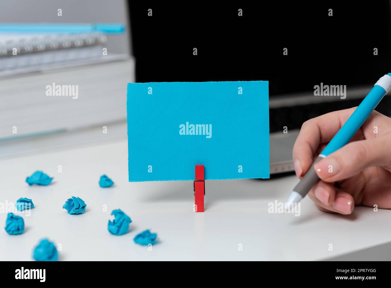 Businesswoman Holding Pen On Desk With Lap Top,Paperwraps And Note With ...