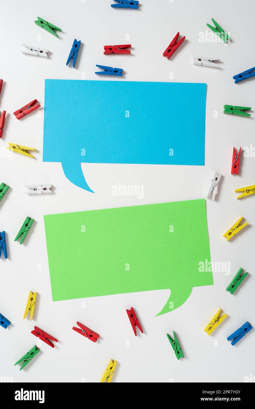 Pegs Placed Around Two Speech Bubbles With Important Information ...