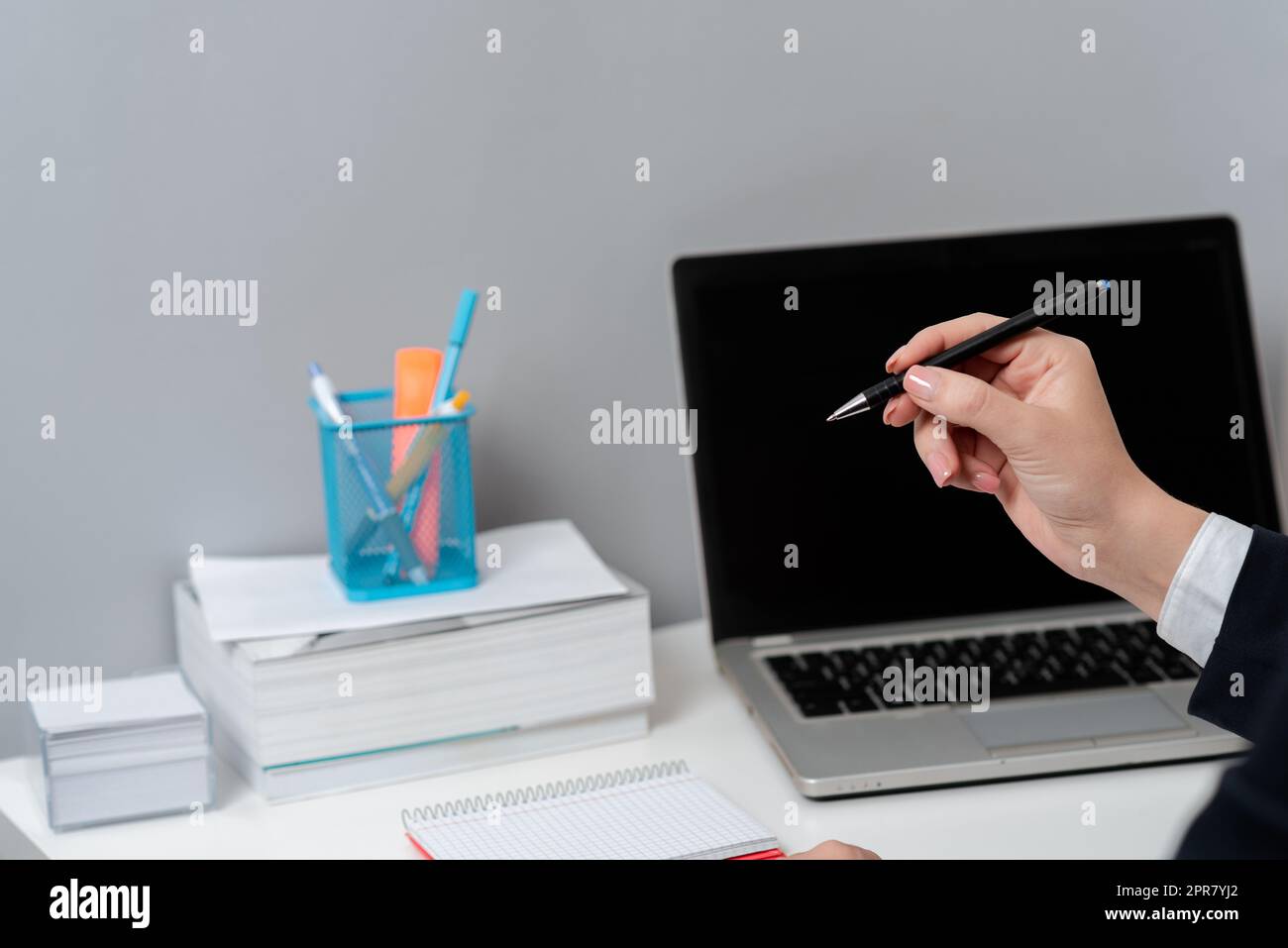 Businesswoman Pointing With Pen On Important Messages. Executive In ...