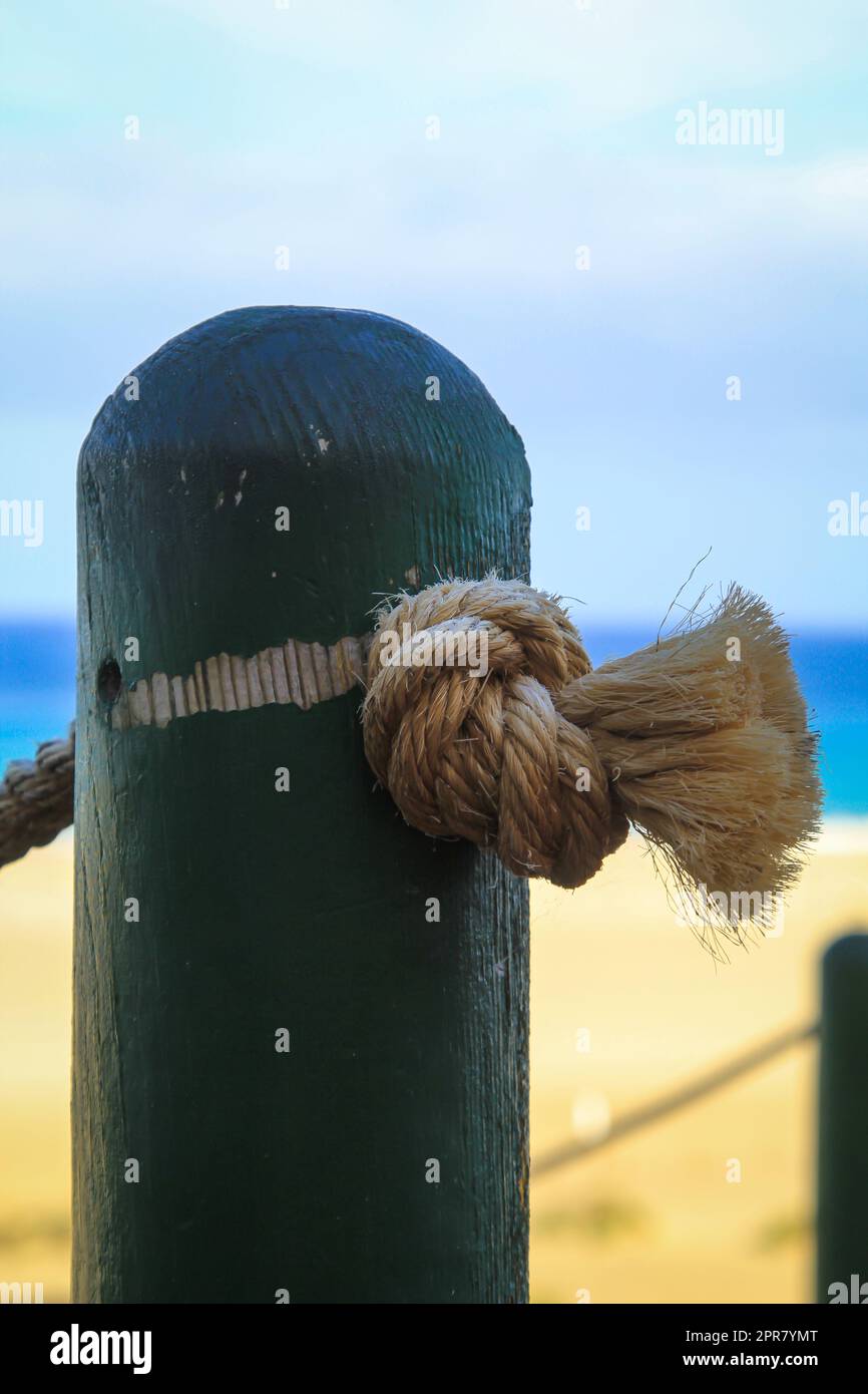 A railing, a barrier to a beach access Stock Photo - Alamy