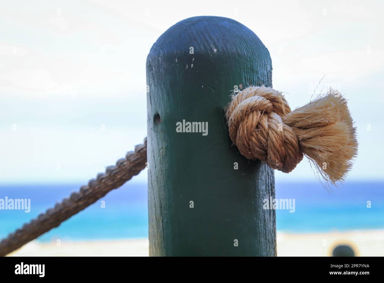 A railing, a barrier to a beach access Stock Photo - Alamy