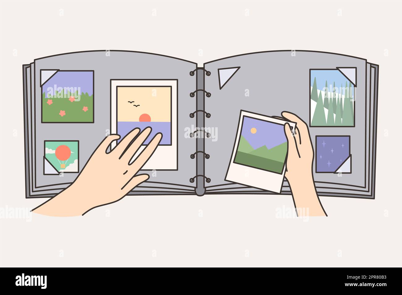 Person putting photographs in album. Woman or man collecting picture in ...