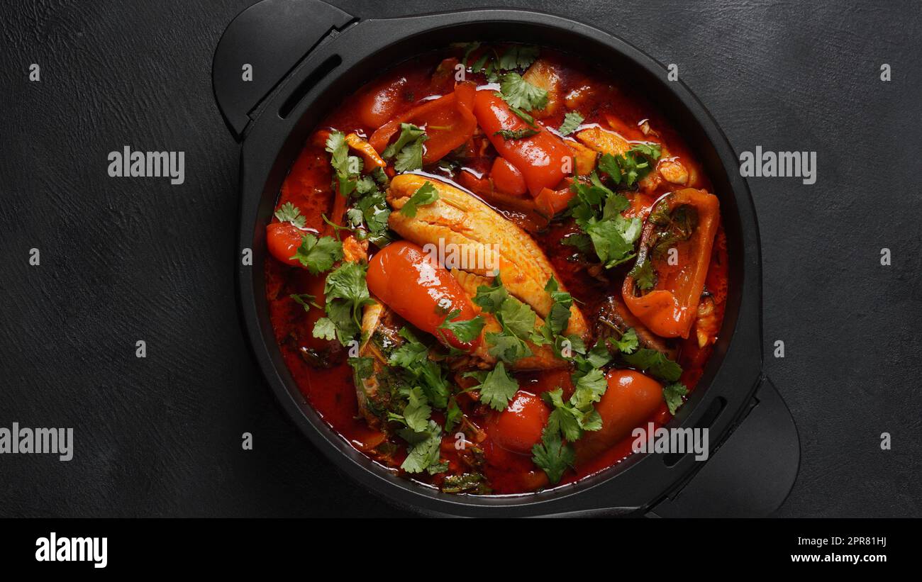 Moroccan fish with chermoula, red peppers and preserved lemon. Spicy ...