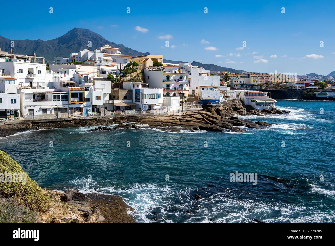 View to La Caleta village with the striking Bay of La Caleta and ...