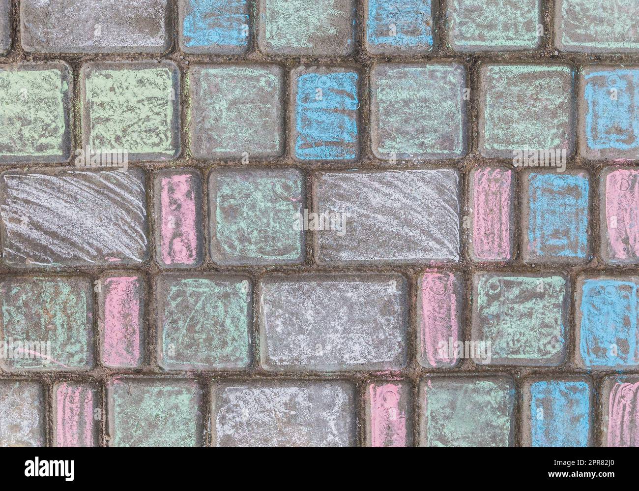 colorful paving slabs, which the children painted with chalk Stock ...
