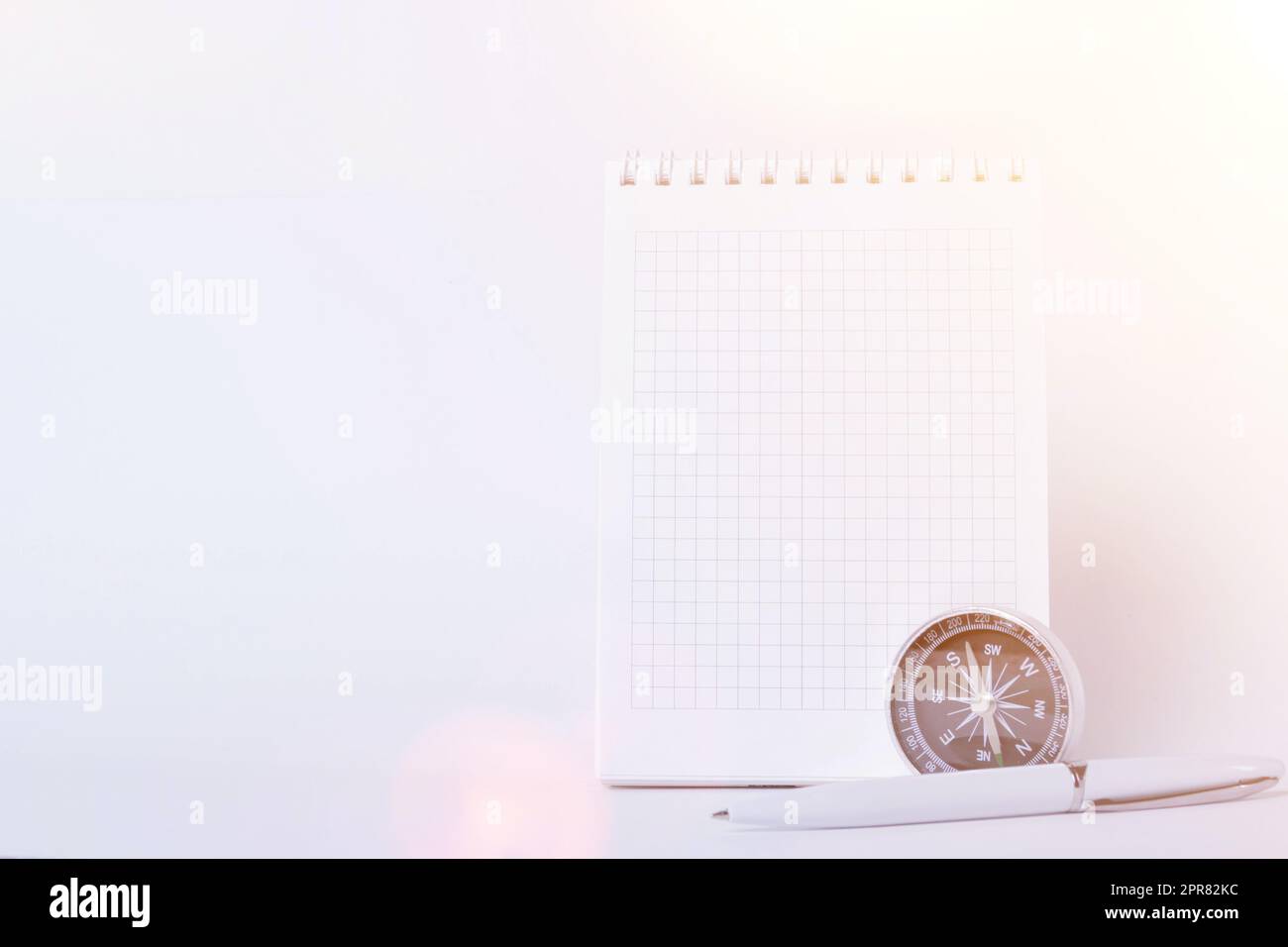 Traveler's notes. A clean notebook with a pen for writing a compass and ...