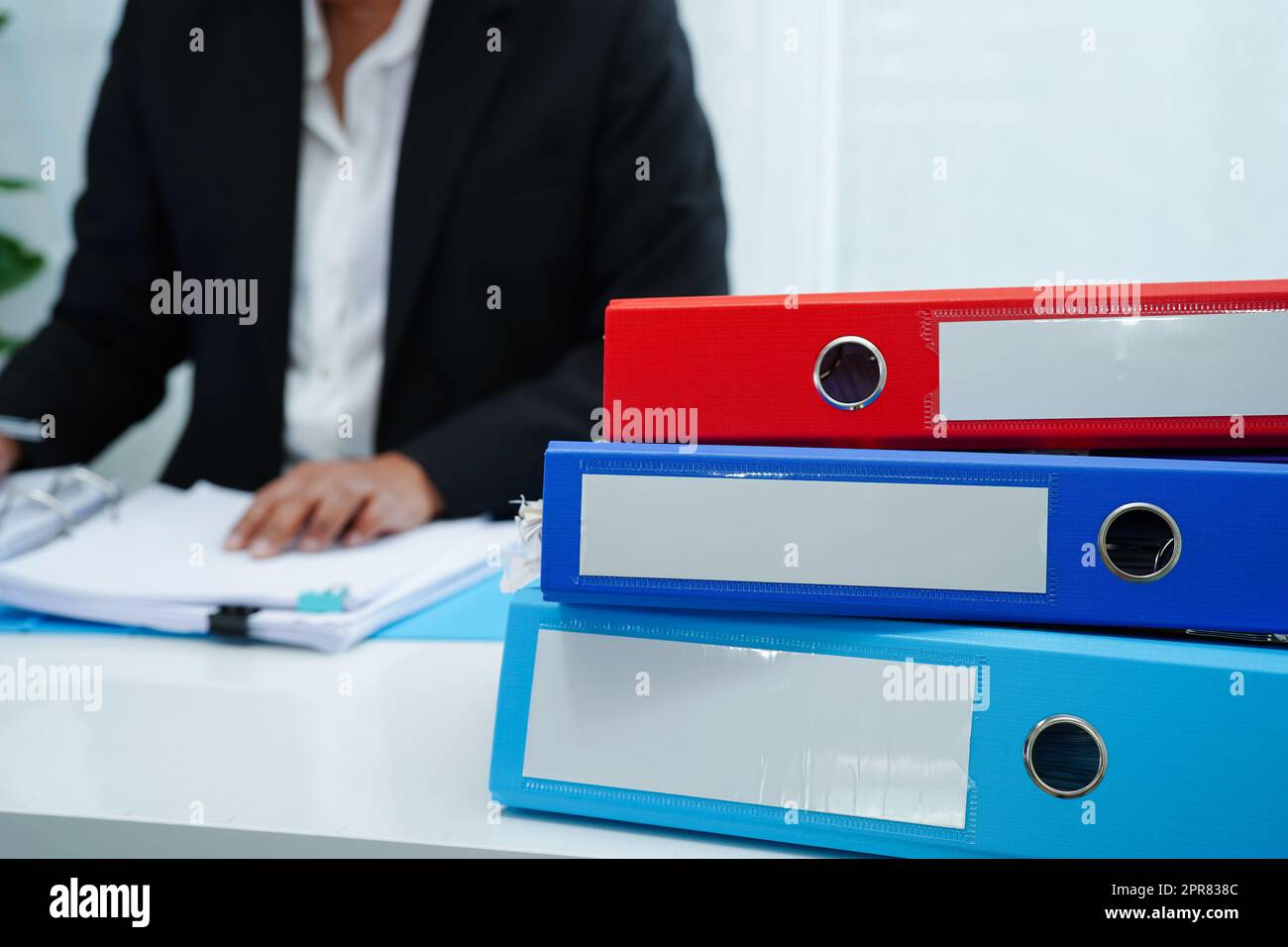 Stack of binder file folder on table in business modern office..on ...