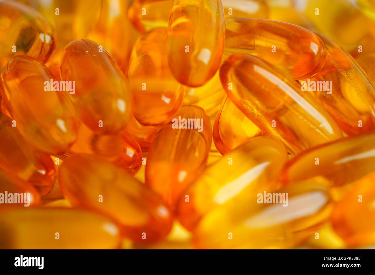Fish oil or Cod liver oil gel in capsules with omega 3 vitamins ...