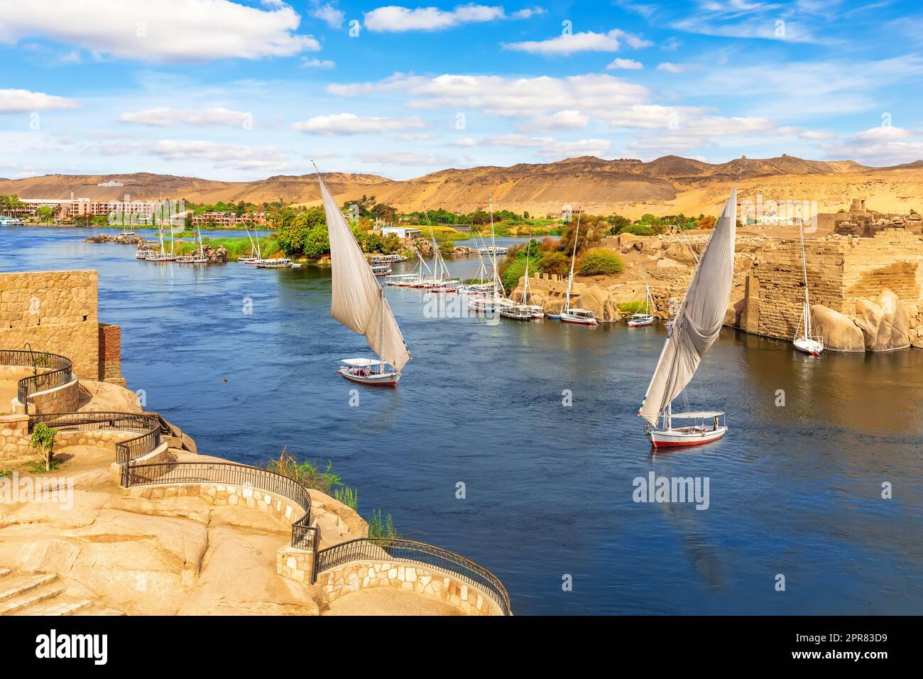 The Nile river scenery and traditional sailboats, Aswan, Egypt Stock ...