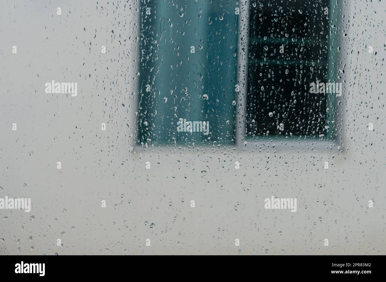 raindrops on the window of the house background Stock Photo - Alamy