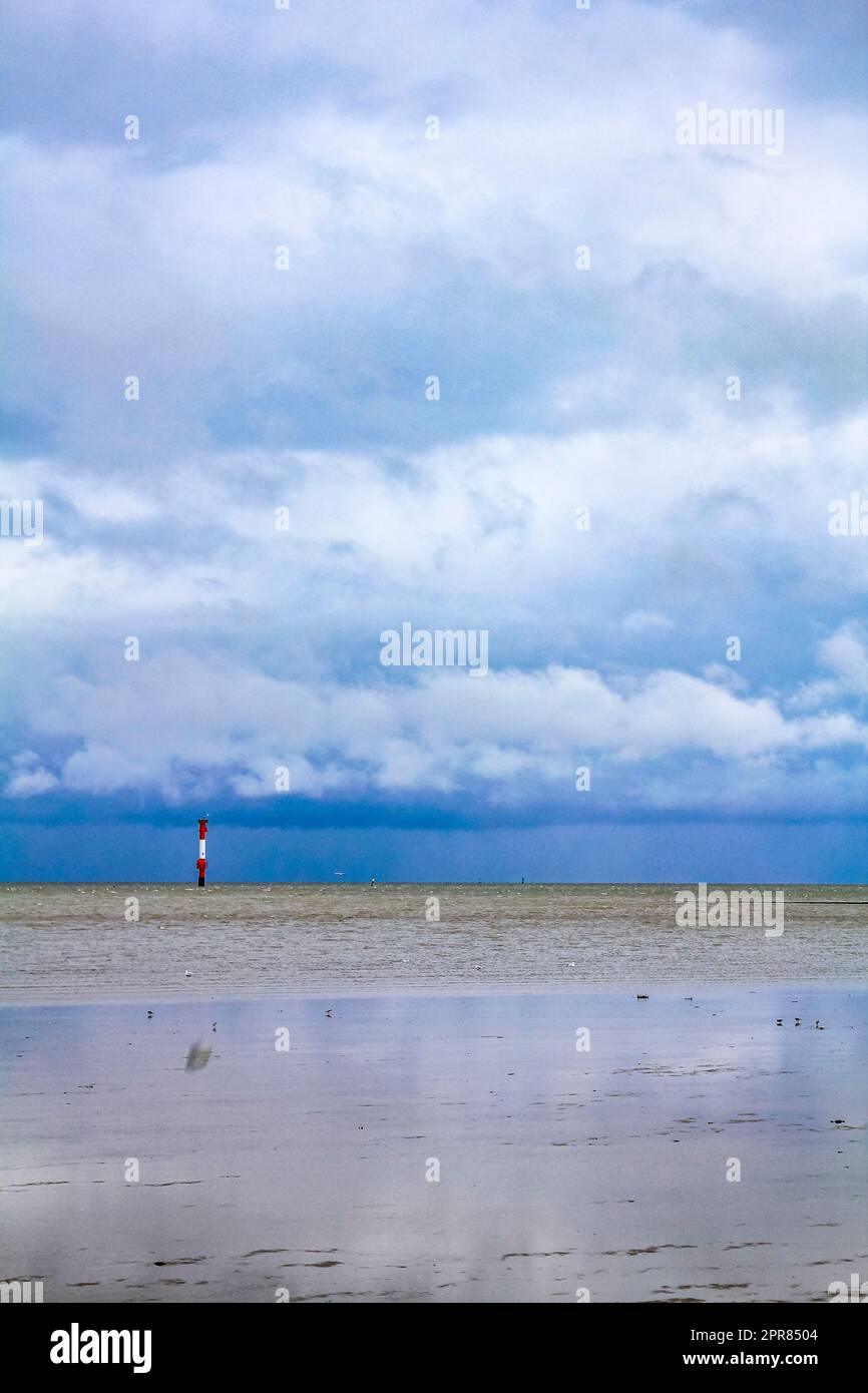 Industrial area cranes red tower lighthouse dyke seascape panorama ...