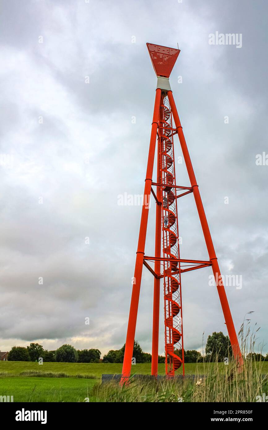 Industrial area cranes red tower lighthouse dyke seascape panorama ...