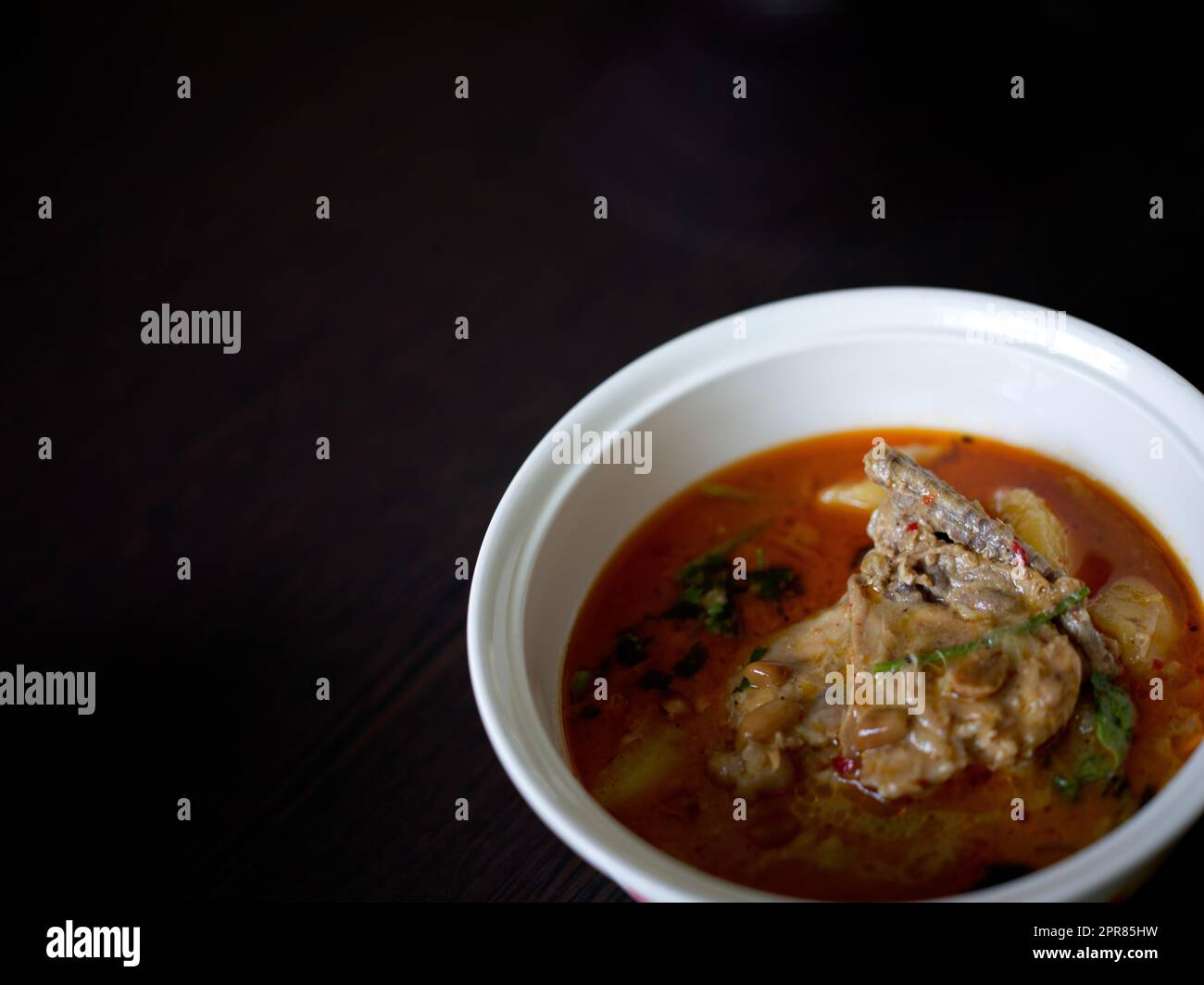 Chicken Mussaman Curry on white bowl Stock Photo - Alamy
