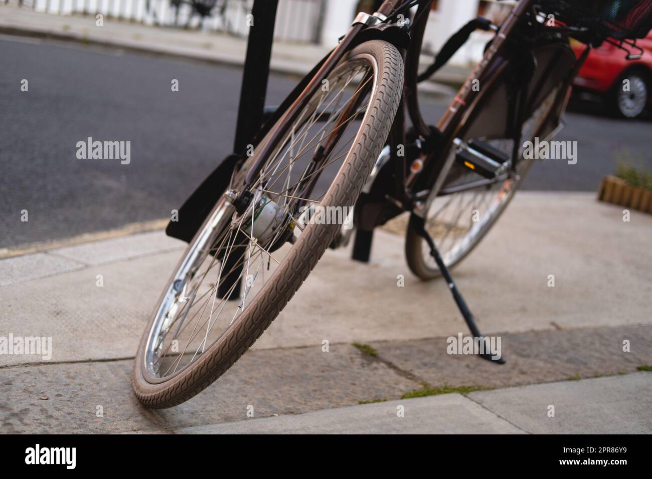 Horizontal close-up photo of the wheel of brown vintage look bicycle ...