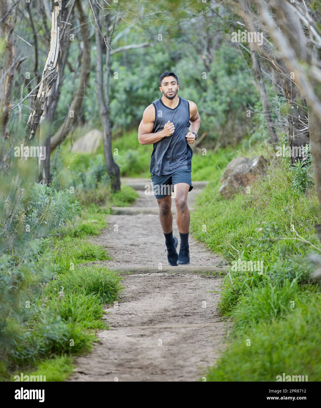 Man running woods hi-res stock photography and images - Alamy