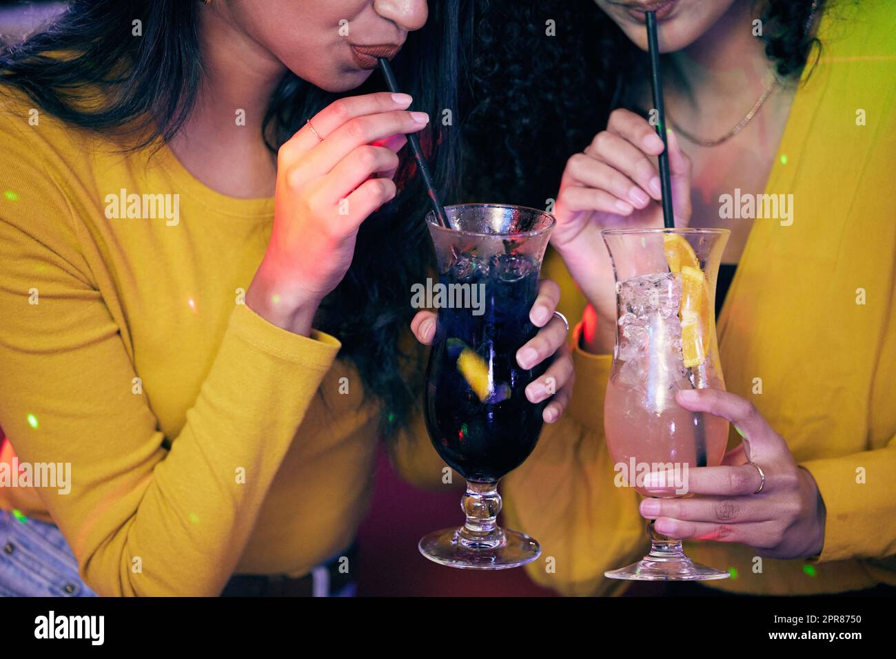 Grab your bestie for a great night out. two unrecognisable women having ...