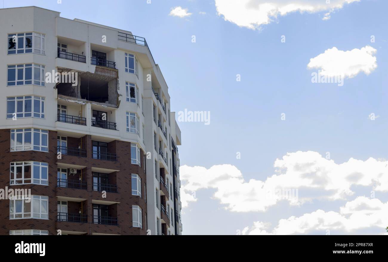 A residential building was damaged after being hit by a rocket. Holes ...