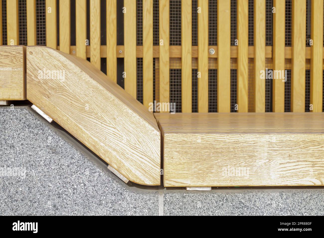 Empty modern wooden benches without people on a sunny day, public ...