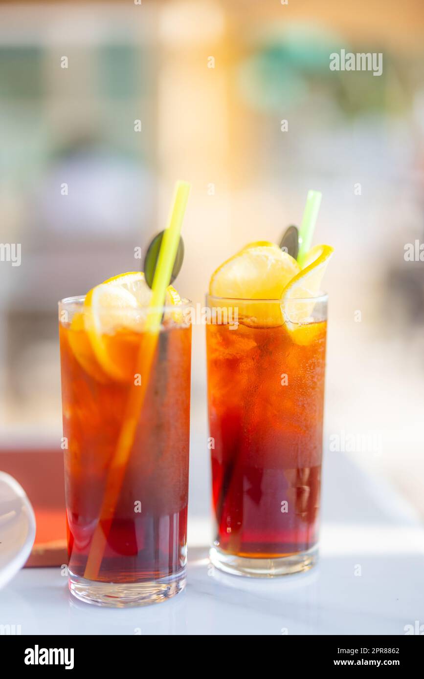 Iced lemon tea at outdoor restaurant Stock Photo - Alamy