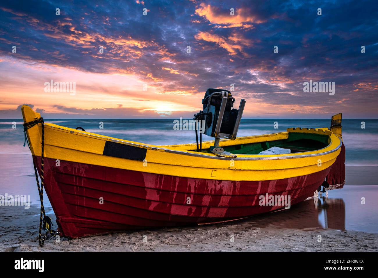 Sunset over boat on sea hi-res stock photography and images - Alamy