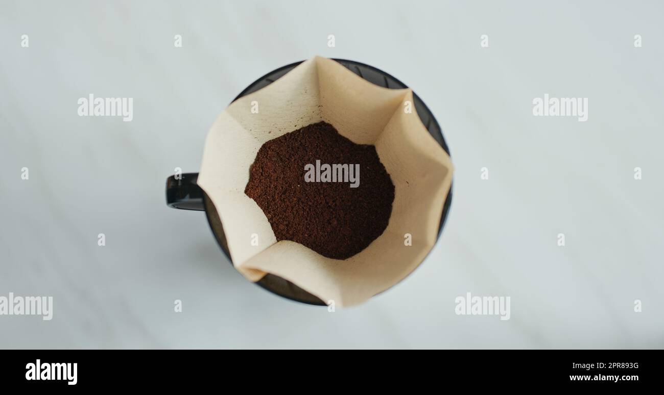 Homemade freshly brewed paper hand drip coffee Stock Photo - Alamy