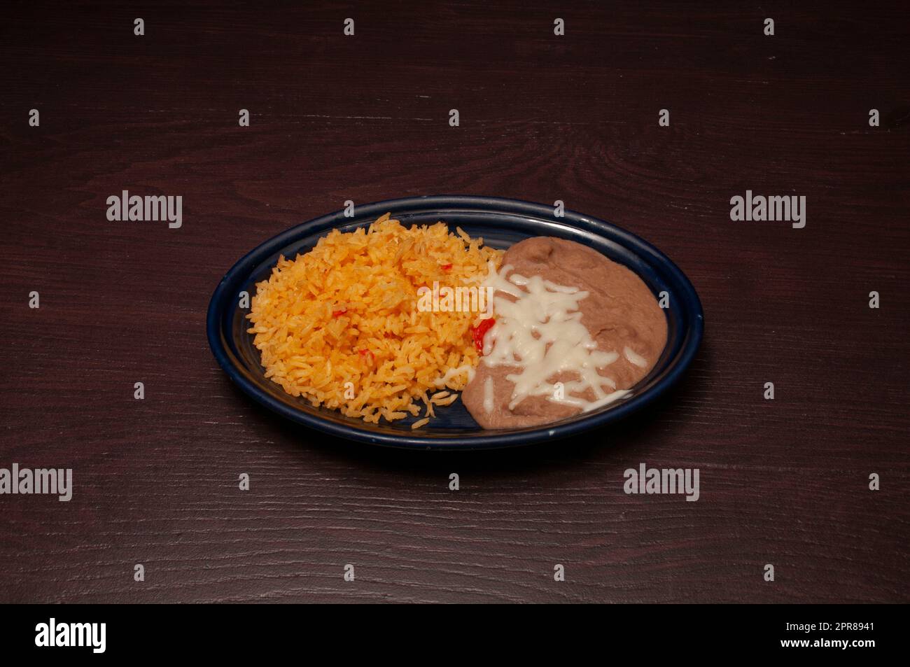 Refried Beans and Rice Stock Photo - Alamy