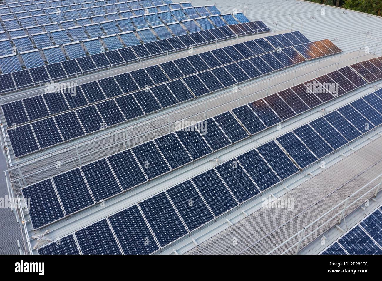 Drone fly over solar panel station in city at roof top building Stock ...