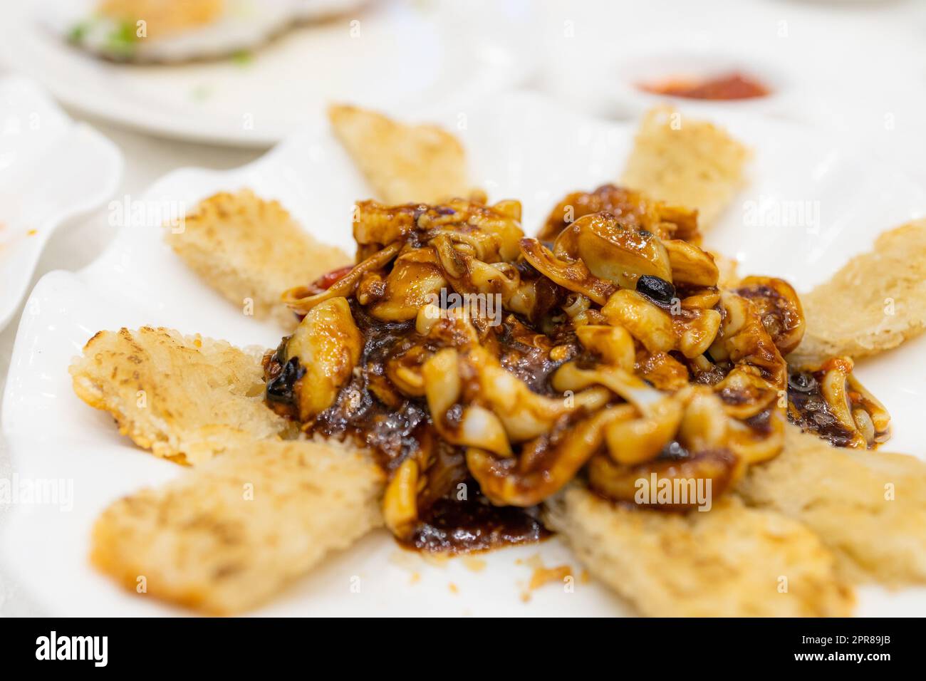 Fried razor clam dishes in restaurant Stock Photo - Alamy