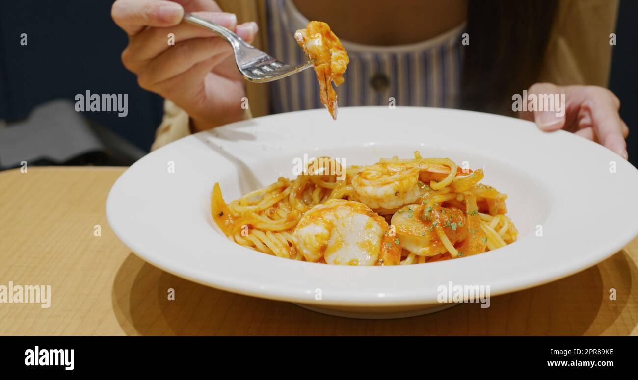 Woman enjoy pasta hi-res stock photography and images - Alamy