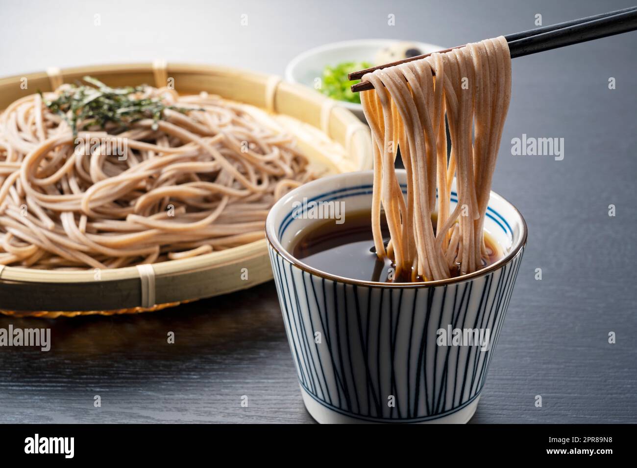 Zaru-soba placed on a black background. Soba noodles dipped in noodle ...