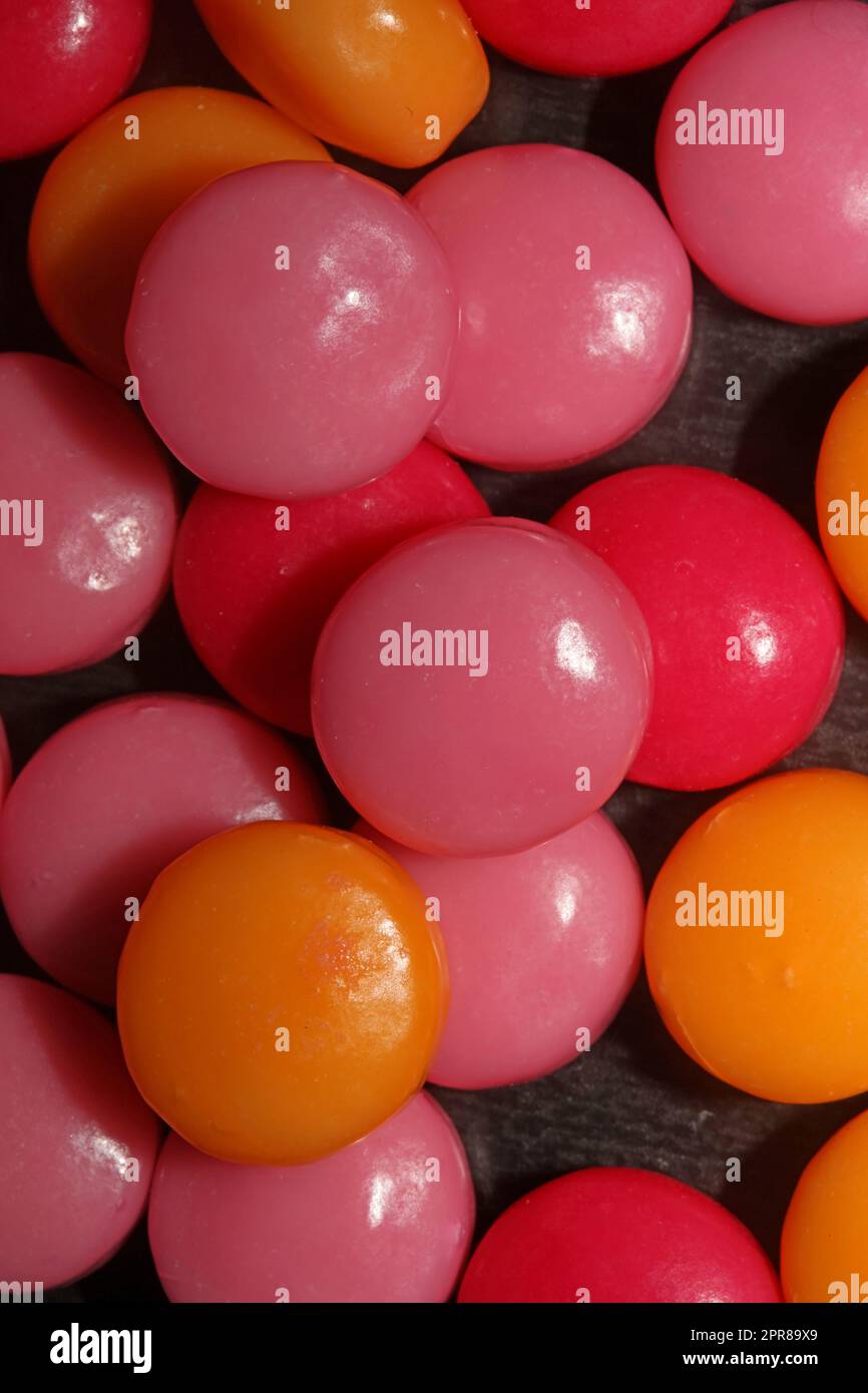 Colorful round sweet kinder bubble gums close up modern background big ...