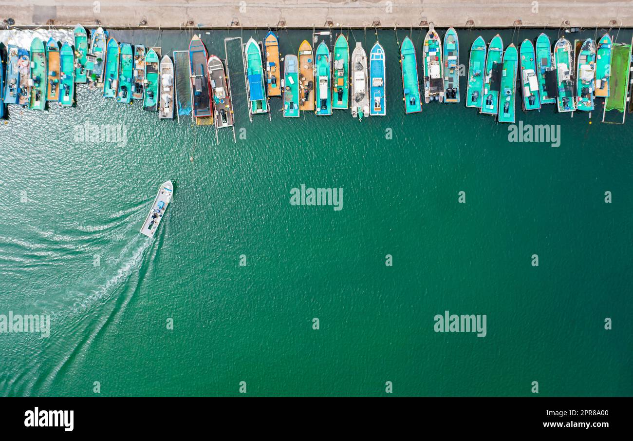 Aerial view of fishing boats at harbor Stock Photo - Alamy
